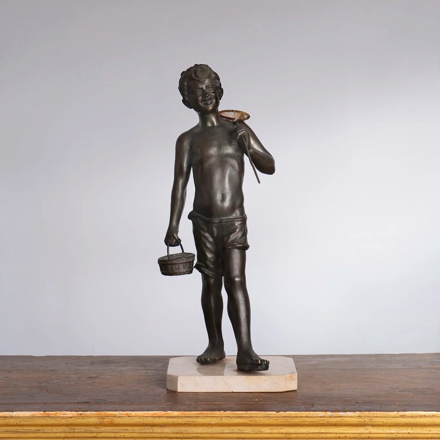19TH CENTURY AMERICAN STATUE OF A FISH MONGER